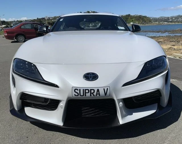 Front plate placement / Let's see those personalized License plates ...