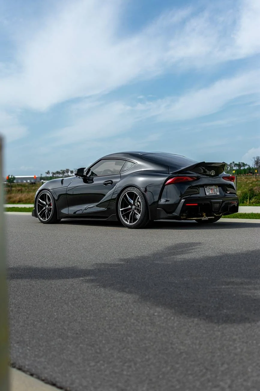 Any pictures of lower Supra with stock wheels + 10mm / 13mm spacers ...