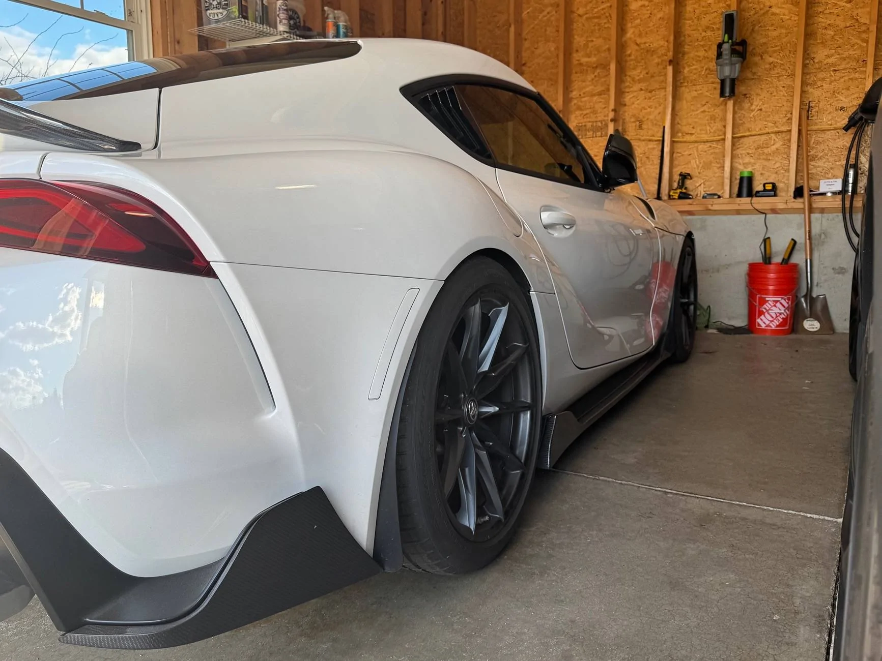 Any pictures of lower Supra with stock wheels + 10mm / 13mm spacers ...